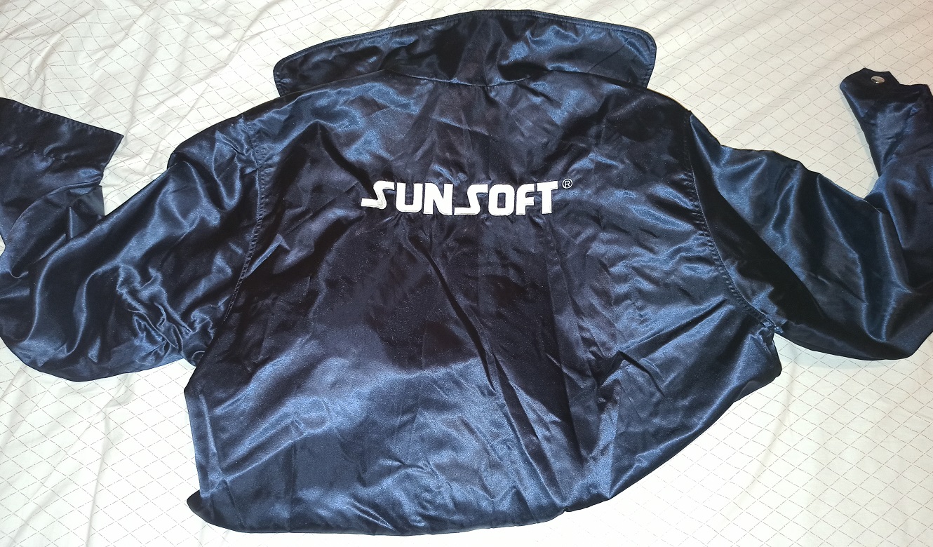 Sunsoft employee clothing - PC Engine Batman press-tour